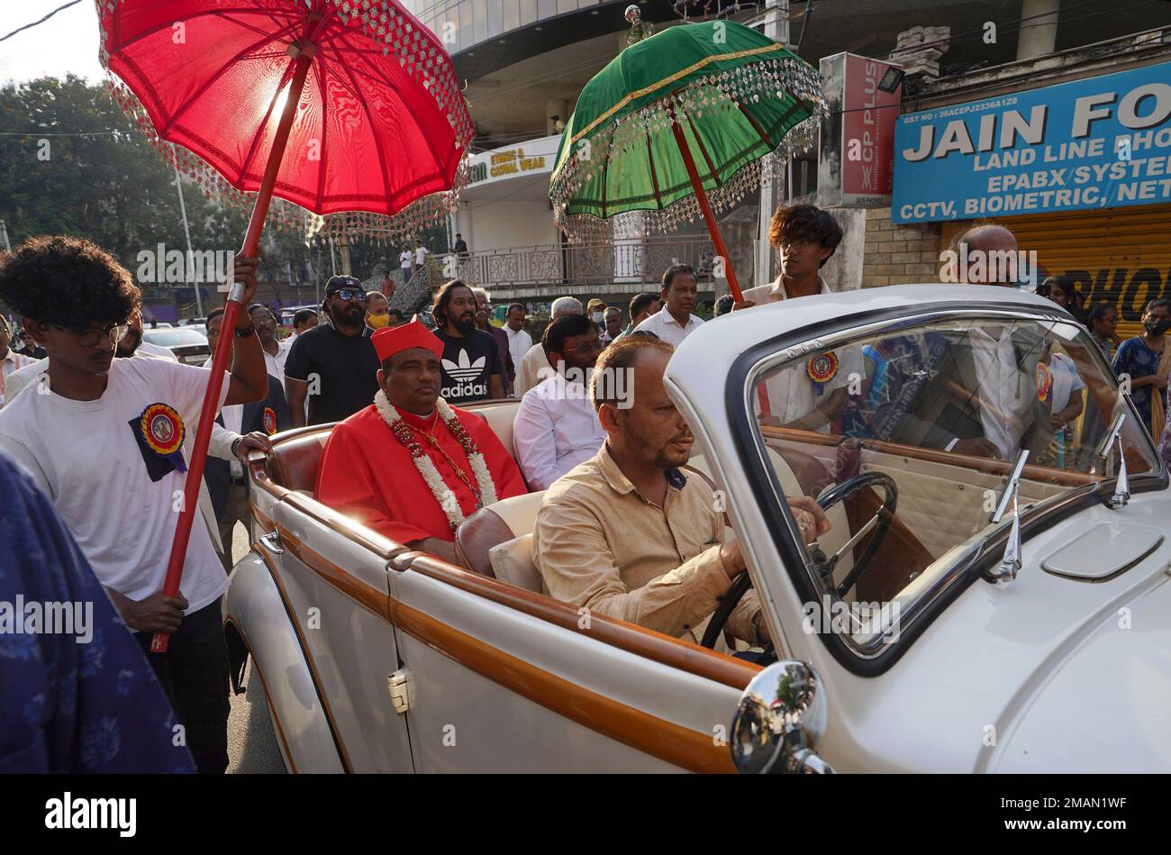 Archbishop of Hyderabad Anthony Poola, in red dress, arrives in a ...