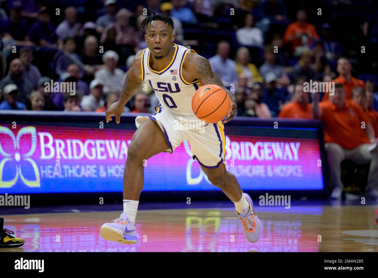 LSU guard Trae Hannibal (0) dribbles during an NCAA college basketball ...