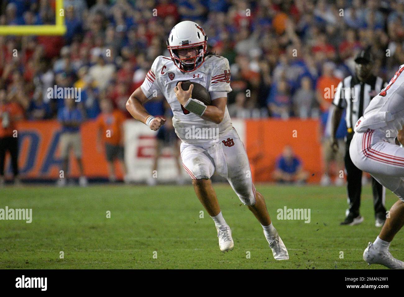 Utah quarterback Cameron Rising (7) runs for yardage during the second ...