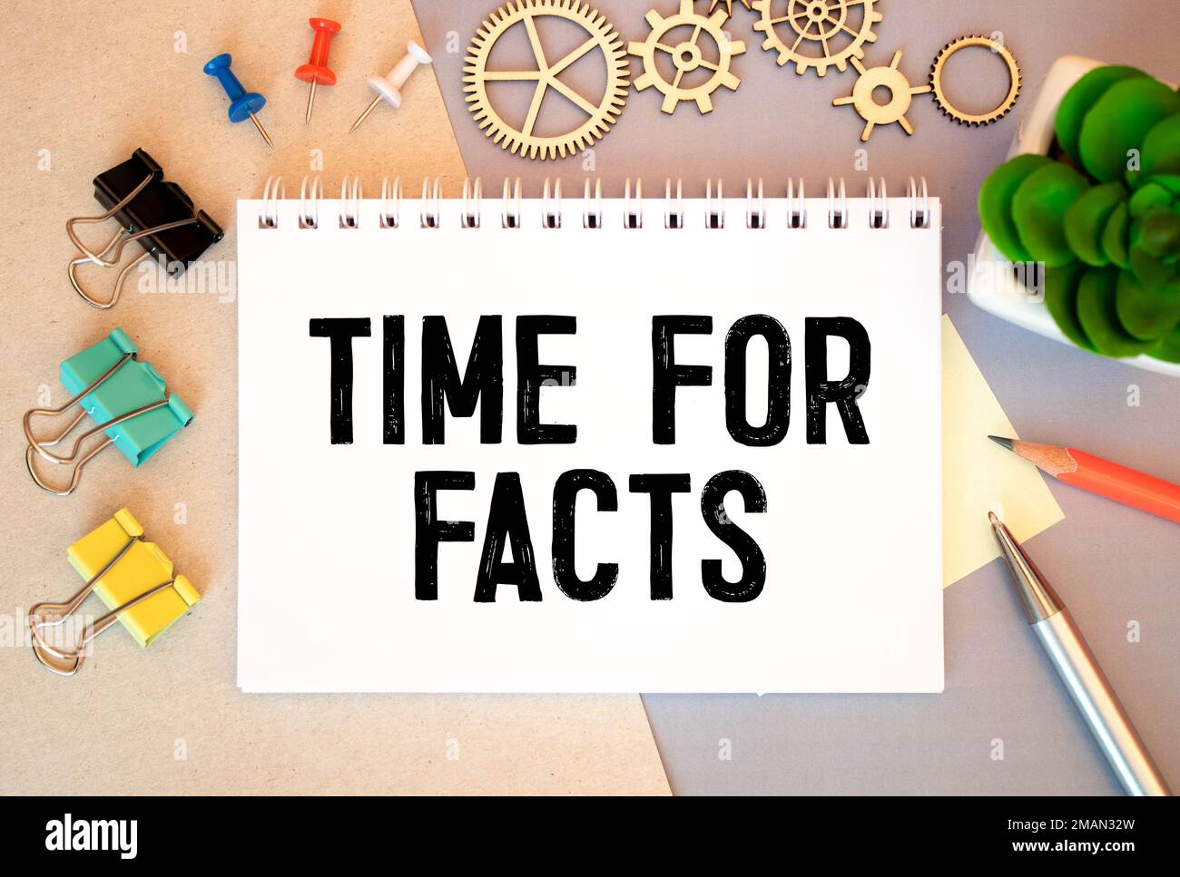 TIME for FACTS text on a torn page from a notebook on a background of ...