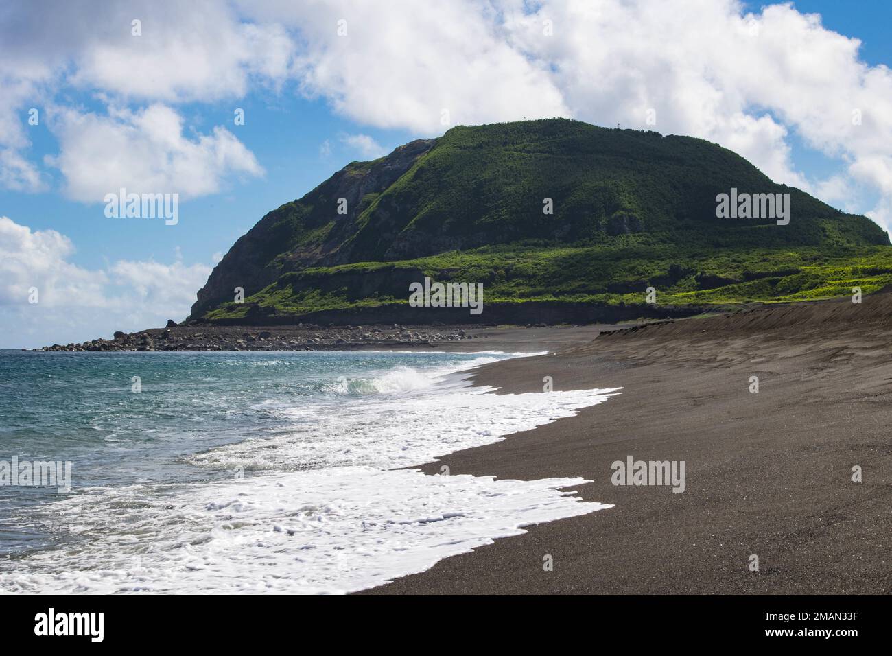 Mt. Suribachi is visible from the volcanic ash beaches at Iwo To, Japan ...