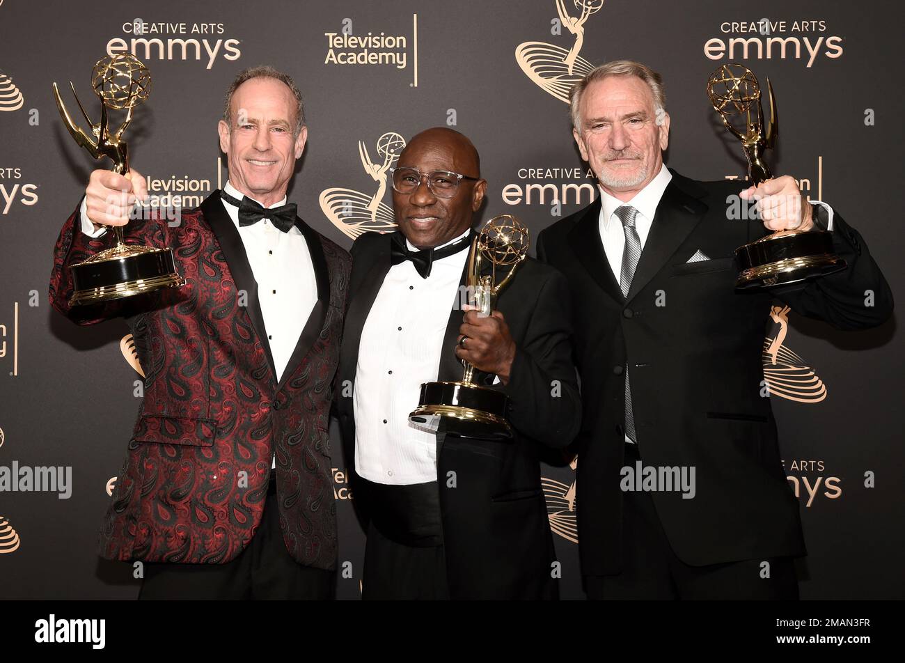 Bruce Green, from left, Allen Merriweather, and Dave Rudd pose in the ...
