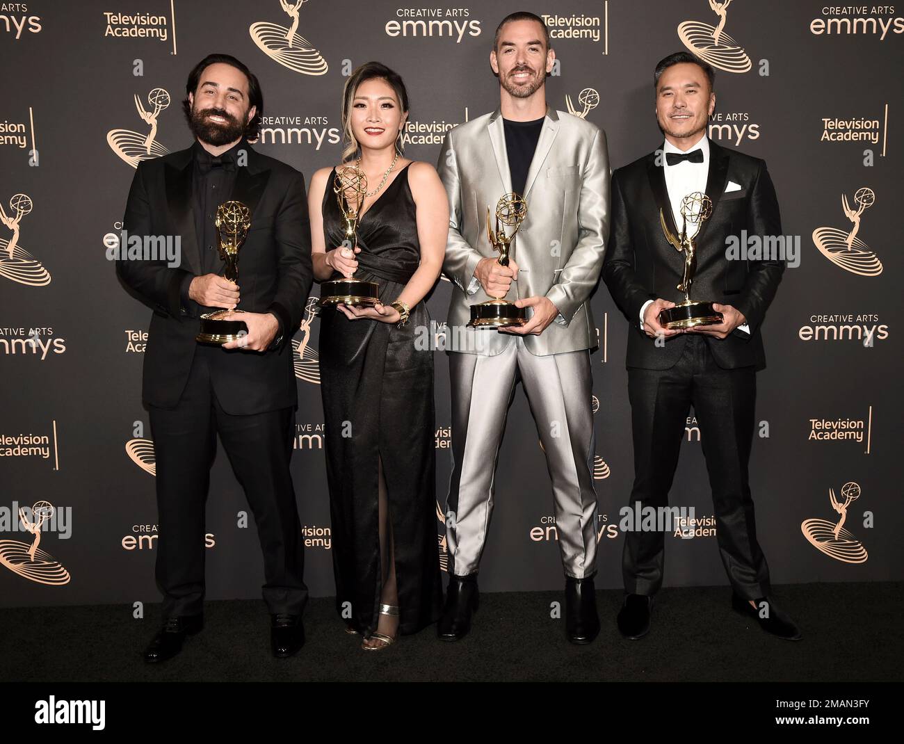 Brandon Beck, from left, Jane Chung, Mark Merrill and Thomas Vu pose in ...