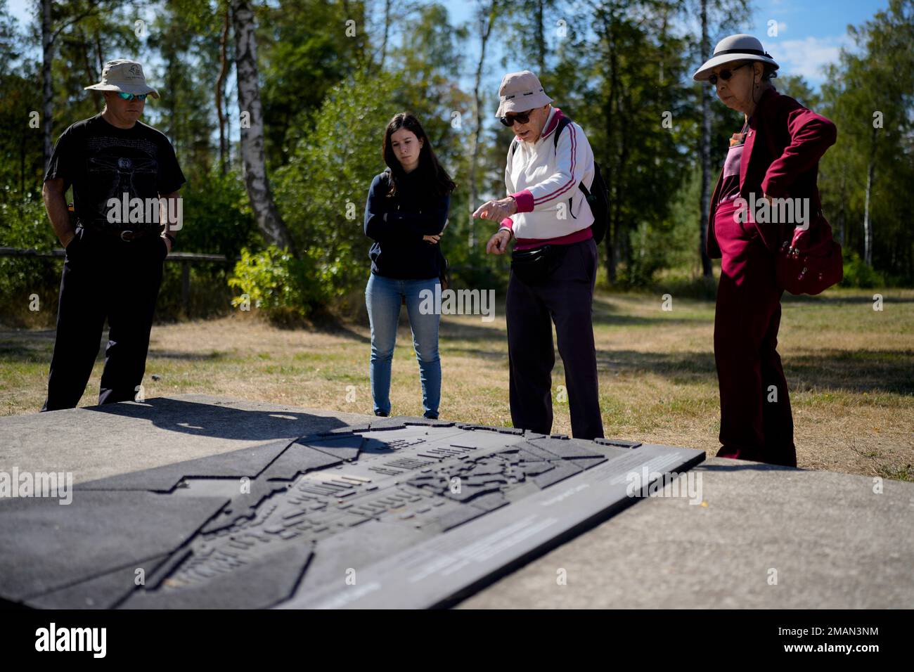 Israeli Olympic racewalker Shaul Ladany, second right, talks to his ...