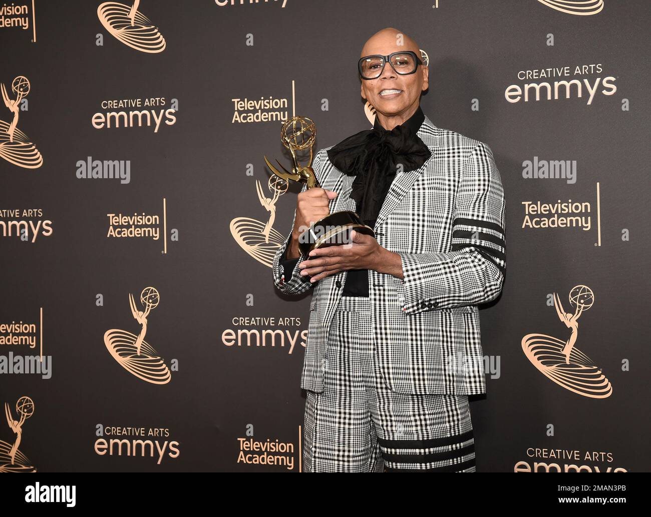 RuPaul Charles poses with the Emmy for outstanding host for a reality ...