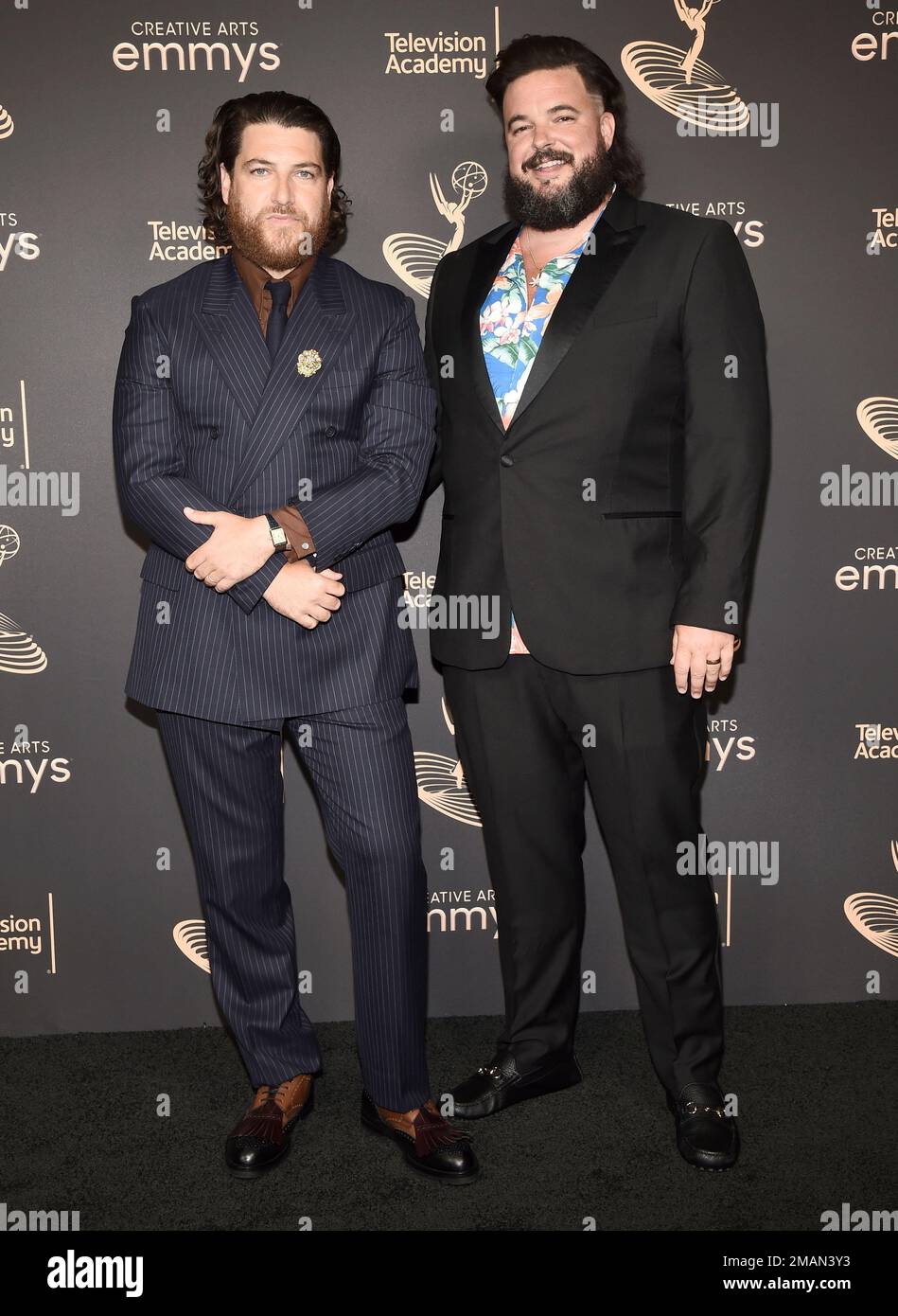 Adam Pally, left, and Jon Gabrus pose in the press room during night ...