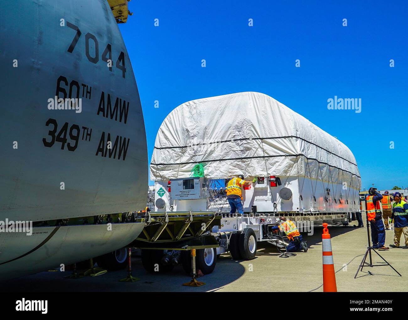 Loadmasters from the 60th Air Mobility Wing and Lockheed Martin Space ...