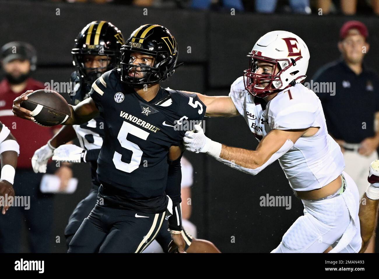 Vanderbilt quarterback Mike Wright (5) runs past Elon defensive back Bo ...