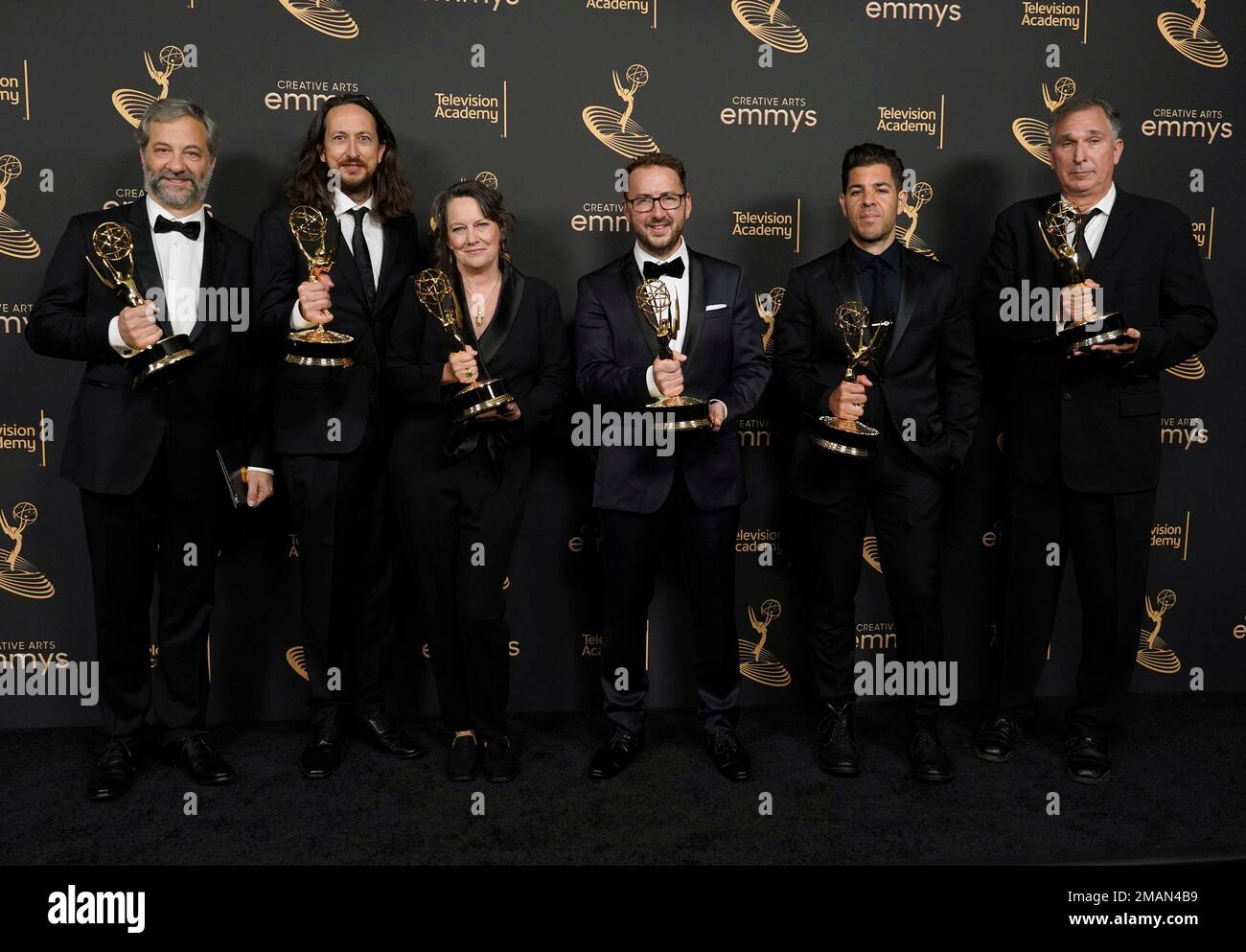 The team from "George Carlin's American Dream" poses in the press room ...