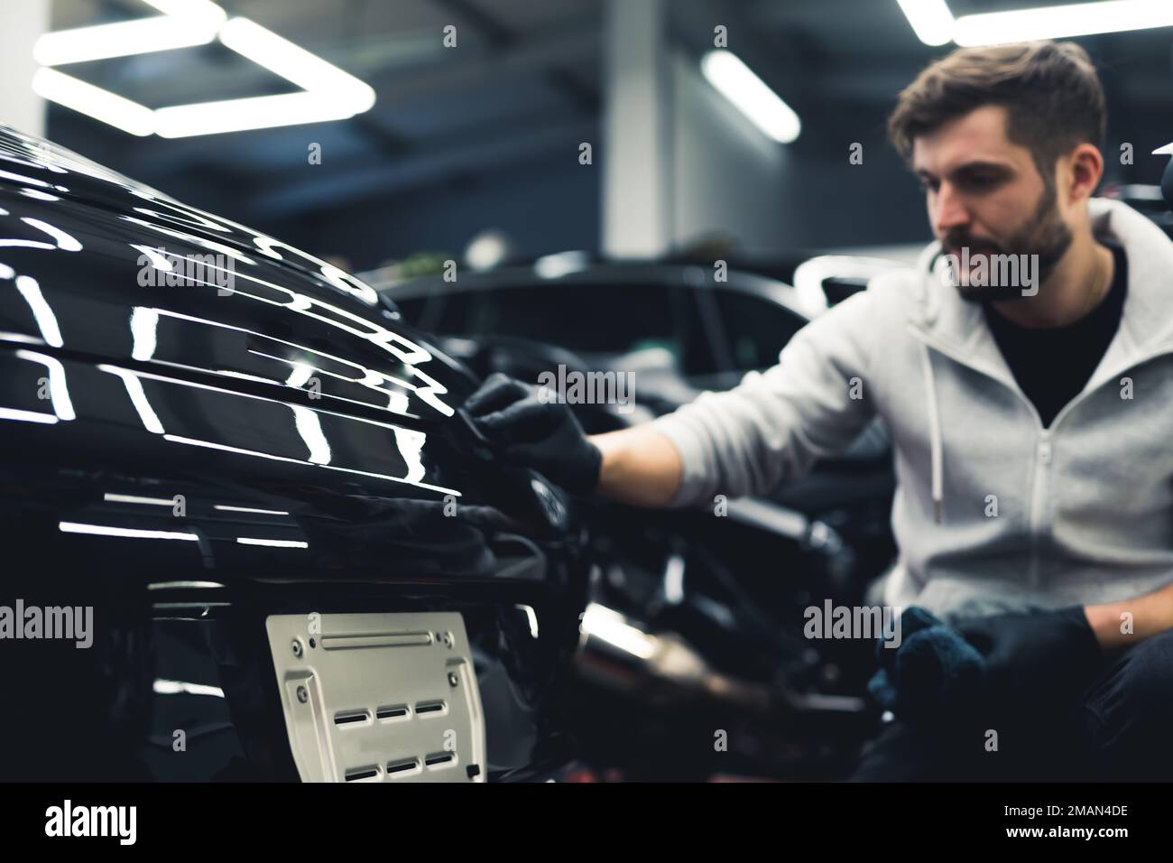 Ceramic coating application process performed in a professional car ...