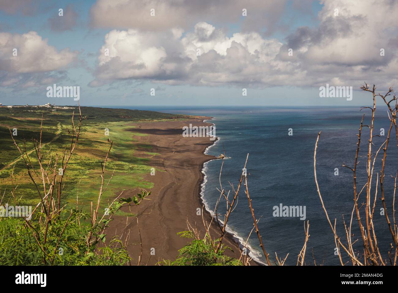 Volcanic ash beaches are visible from atop Mt. Suribachi at Iō Tō ...