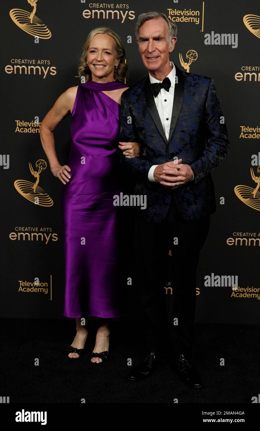Liza Mundy, left, and Bill Nye pose in the press room on night one of ...