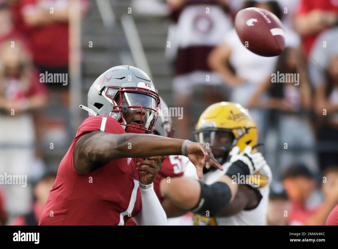 Washington State quarterback Cameron Ward throws a pass during the ...