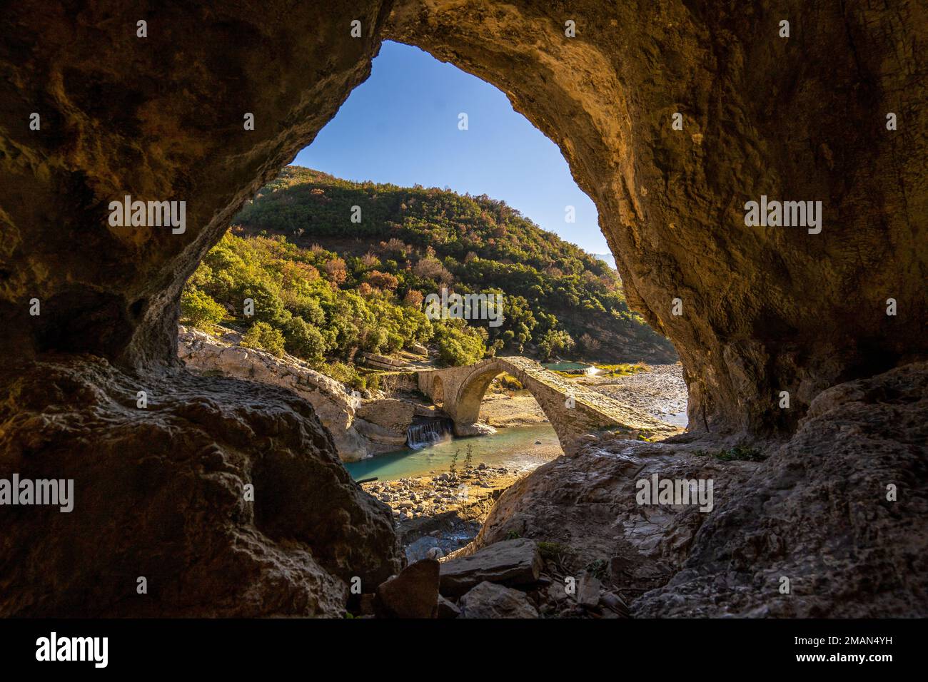 Old stone bridge with arch shape photographed during sunset. photo ...