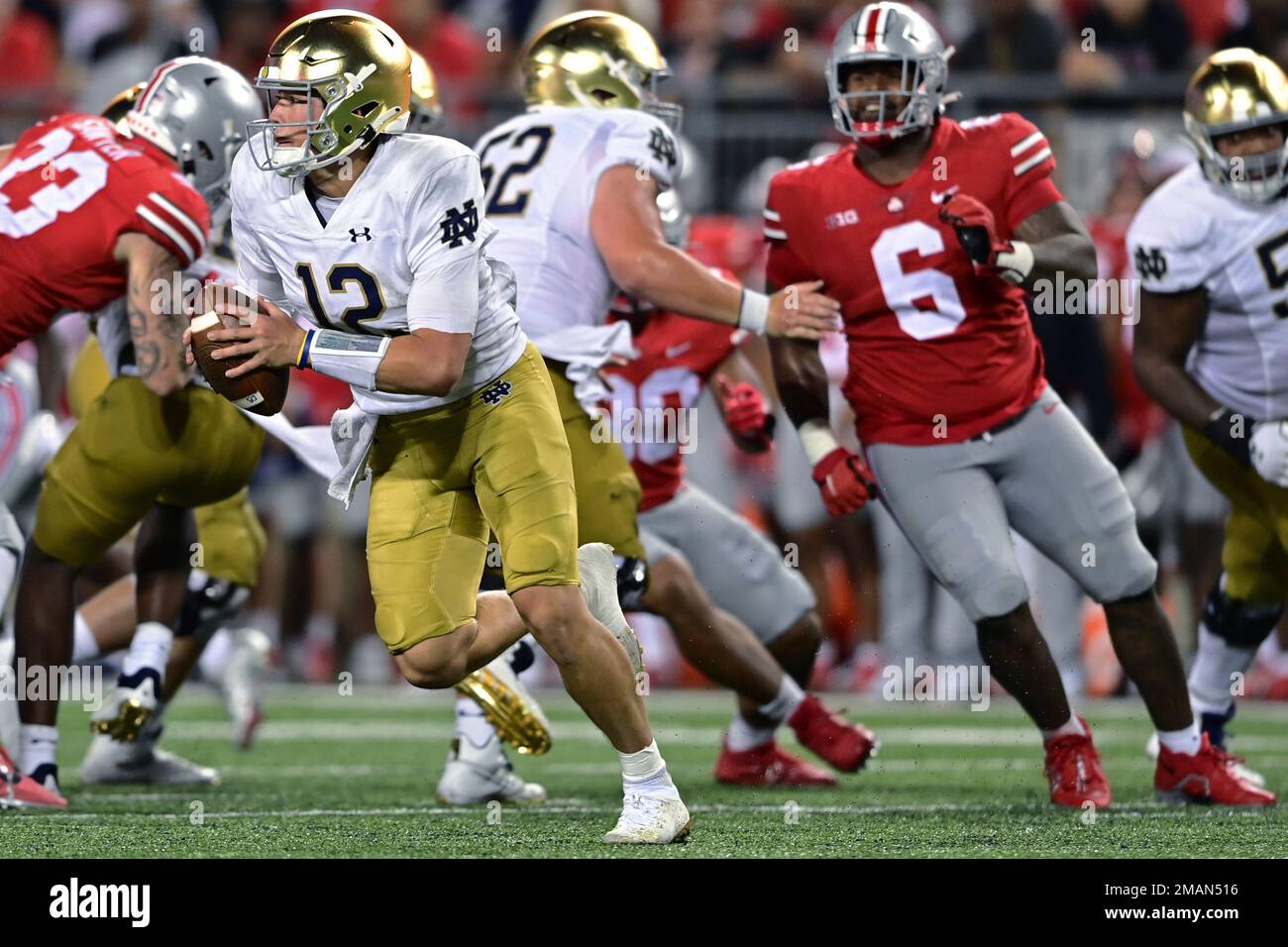 Notre Dame quarterback Tyler Buchner looks for a receiver during the ...
