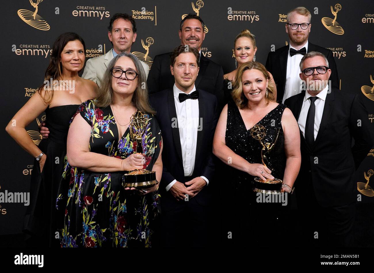 The team from Sandy Hook Promise's "Teenage Dream" poses in the press ...