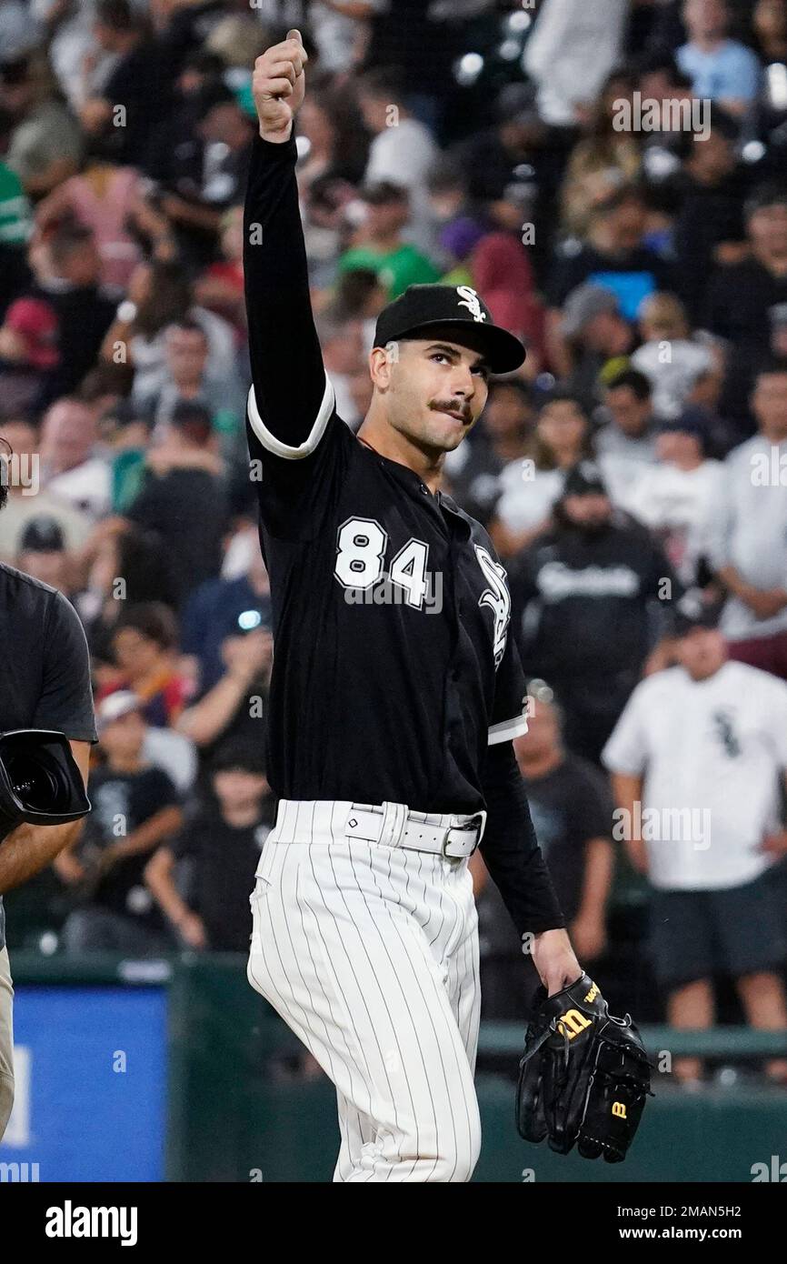 Chicago White Sox starting pitcher Dylan Cease gives a thumbs-up as he ...