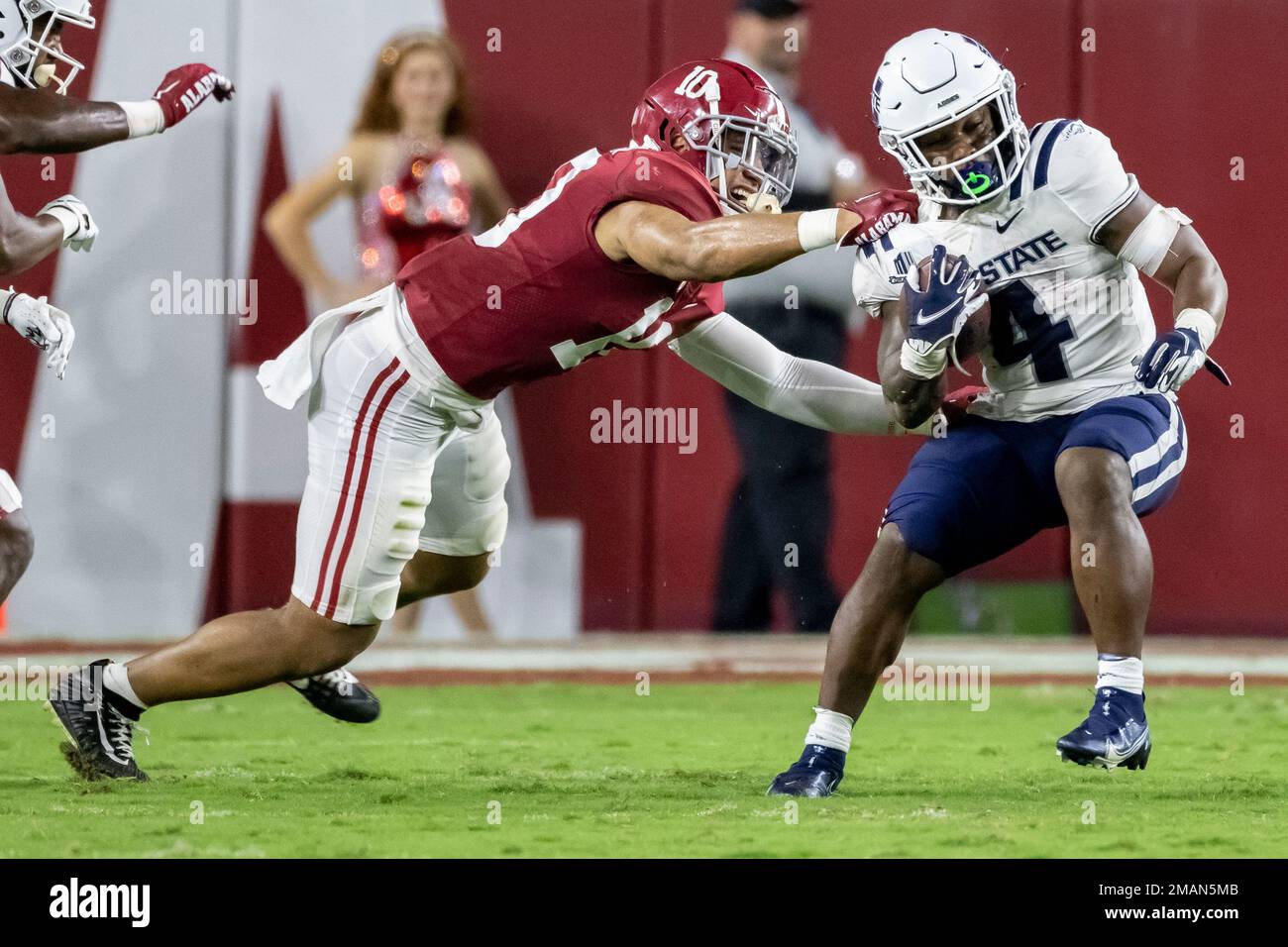 Alabama linebacker Henry To'oTo'o (10) pursues Utah State running back ...