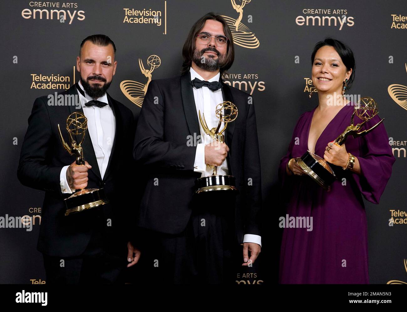 Bruno Couchinho, from left, Julien Georgel, and Anne-Laure To pose in ...
