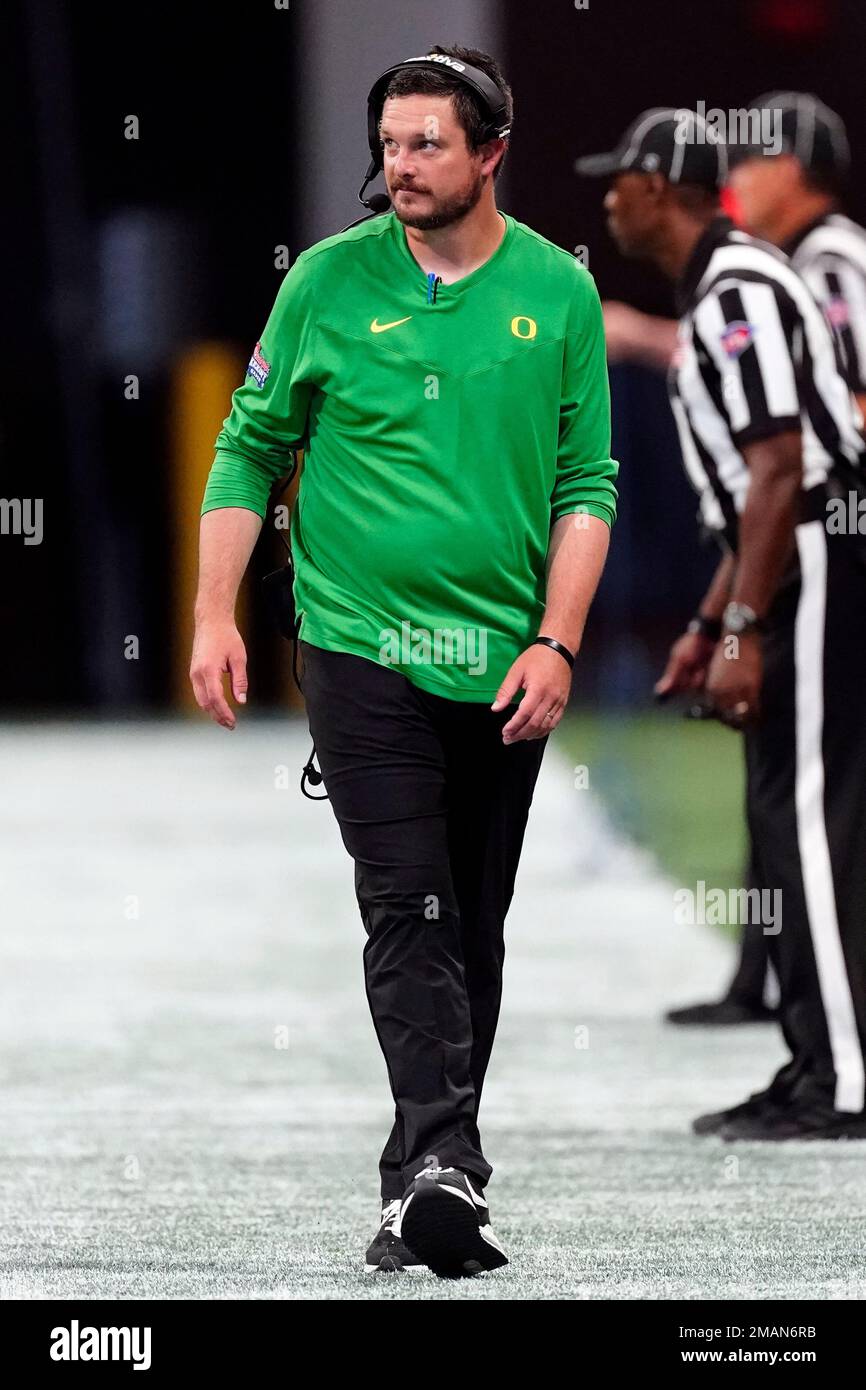 Oregon head coach Dan Lanning paces the sideline in the second half of ...