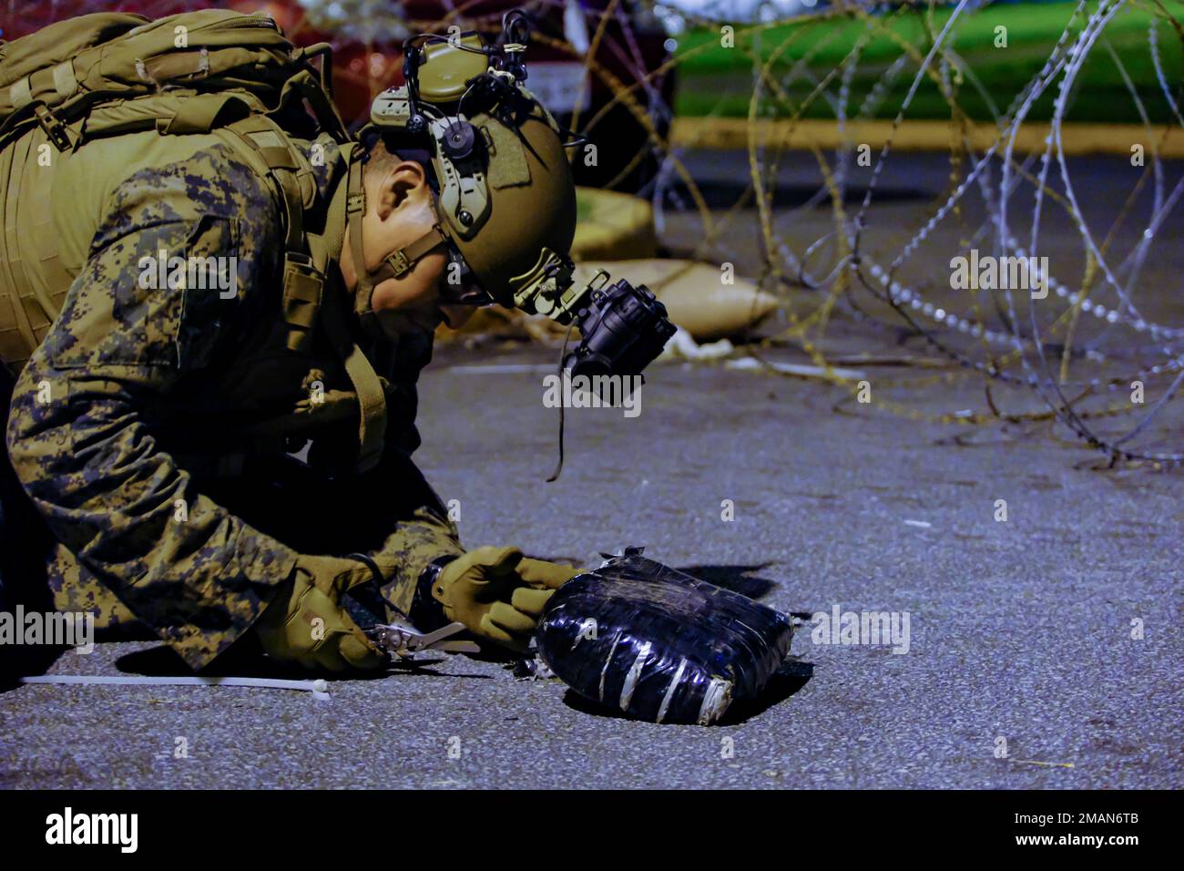 U.S. Marine Corps Staff Sgt. Cesar Martinez an explosive ordnance ...