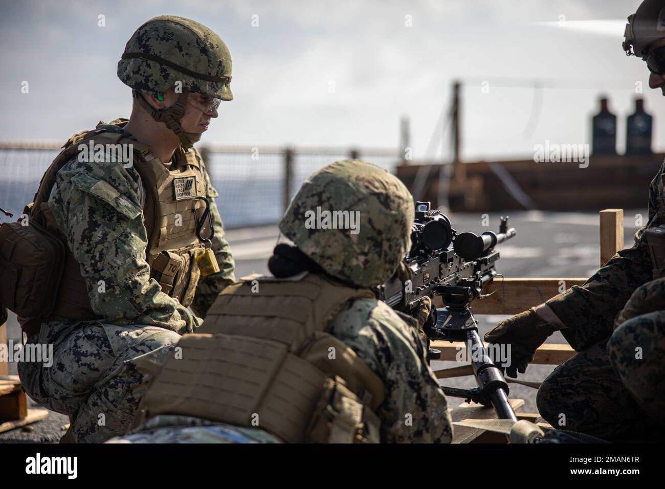 U.S. Navy equipment operator constructionman Ty Mathis and builder ...