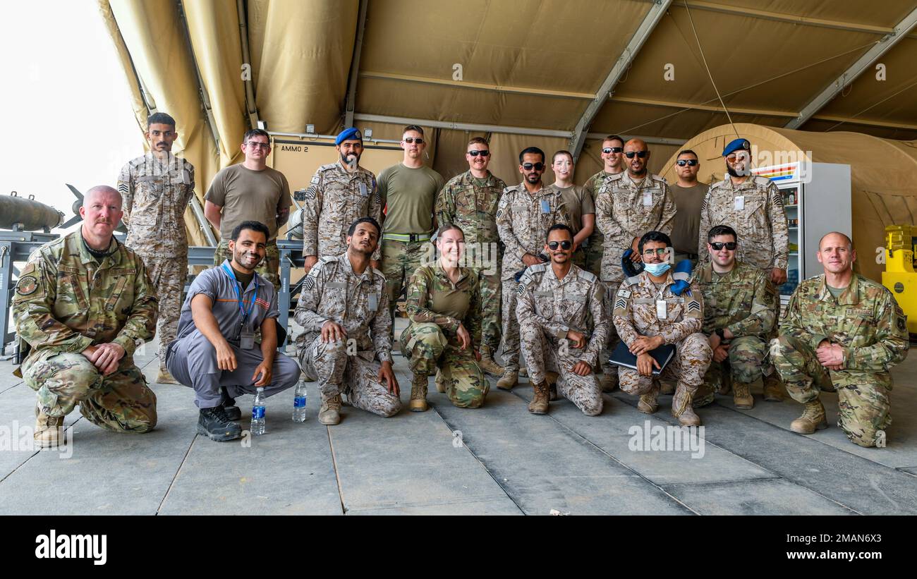 U.S. Air Force and Royal Saudi Air Force service members pose for a ...