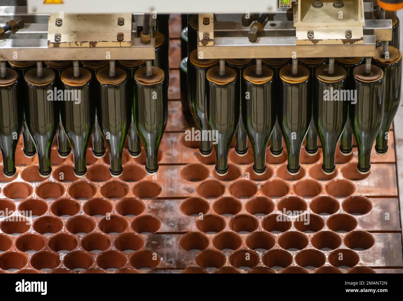 Production of cremant sparkling wine in Burgundy, France. Automatically ...