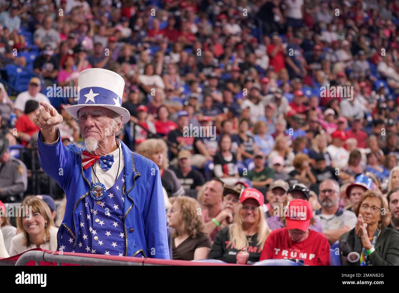A supporter dressed as Uncle Sam shows his support while Rep. Marjorie ...