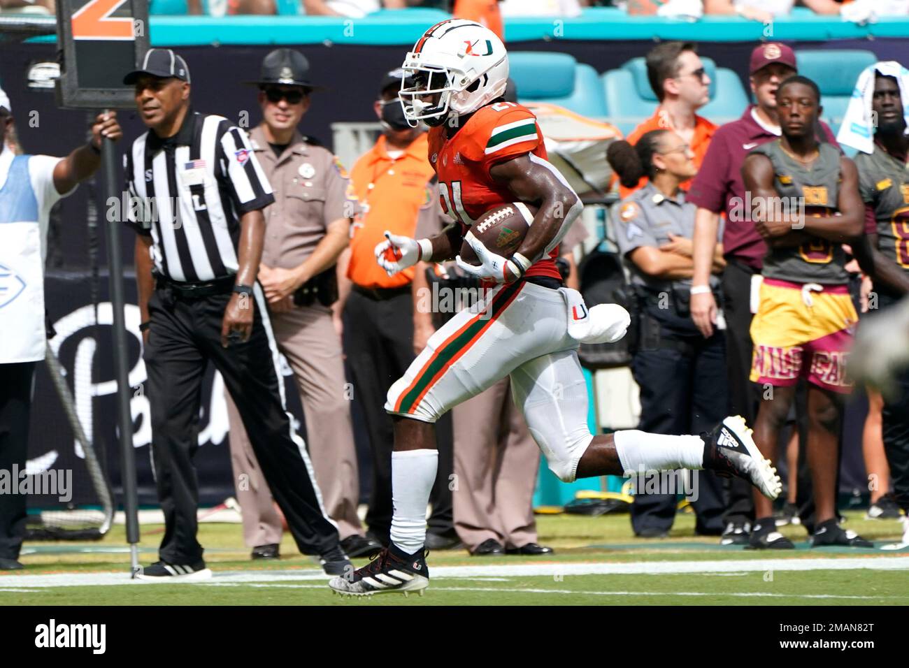 Miami running back Henry Parrish Jr. runs for a first down during the ...
