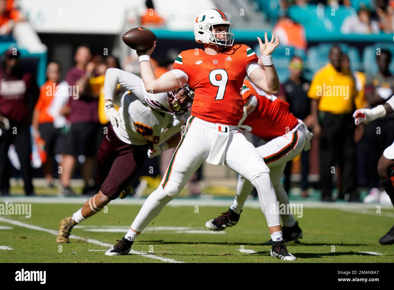 Miami quarterback Tyler Van Dyke (9) stands back to pass during the ...