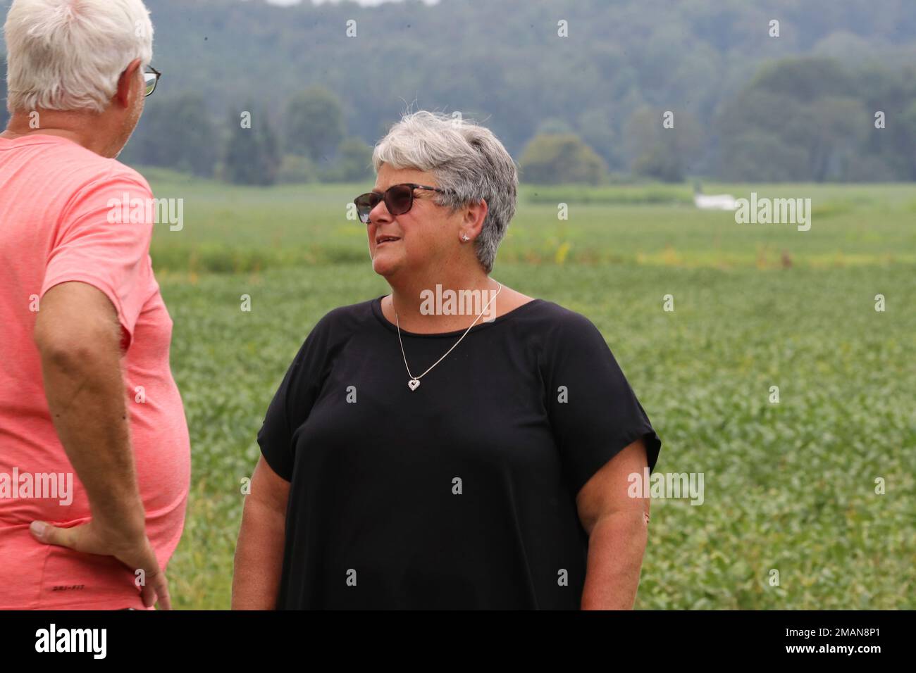Jane Alsup, right, talks with Jackie Murry, left, about the airplane ...