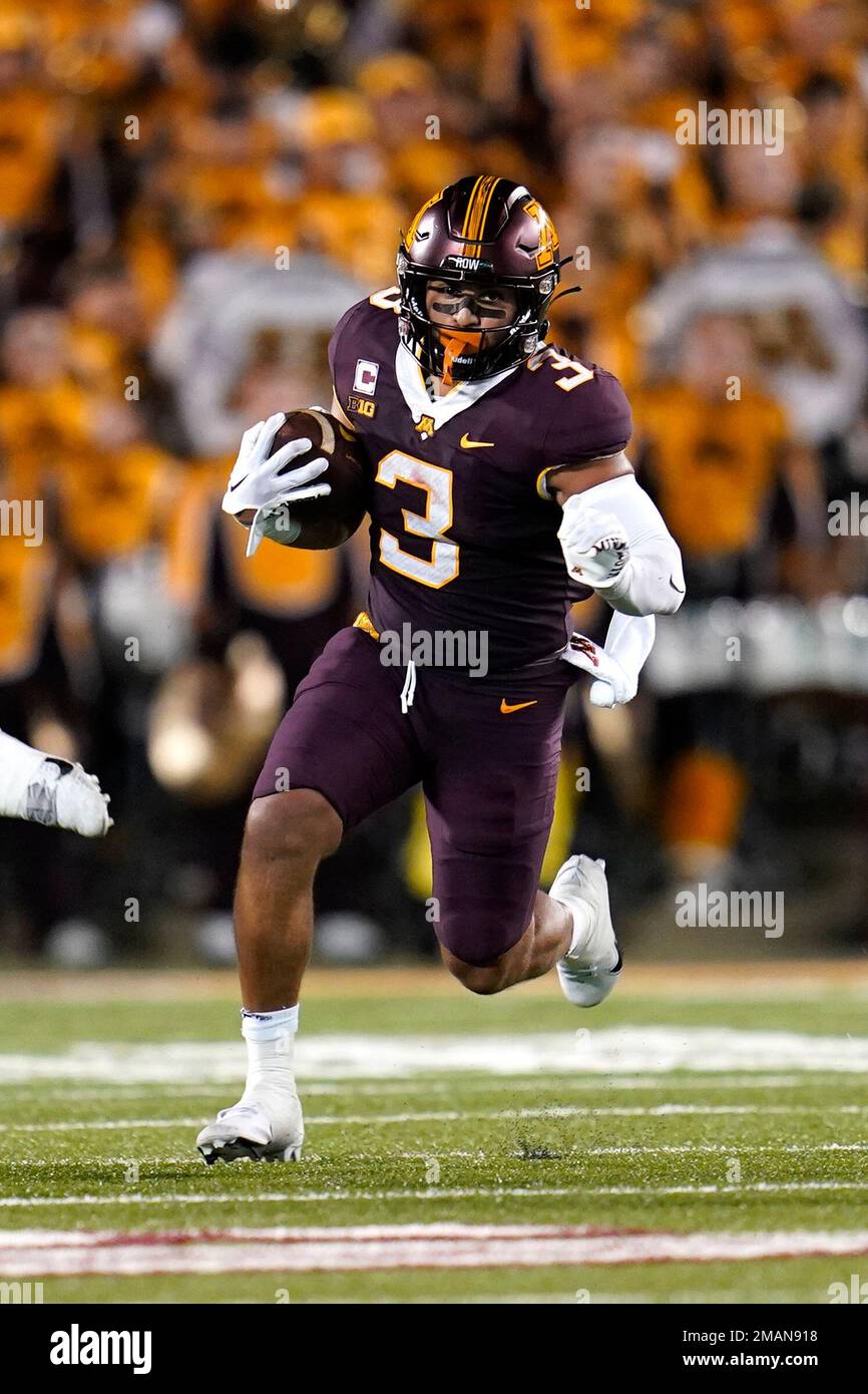 Minnesota running back Trey Potts carries the ball during the first ...