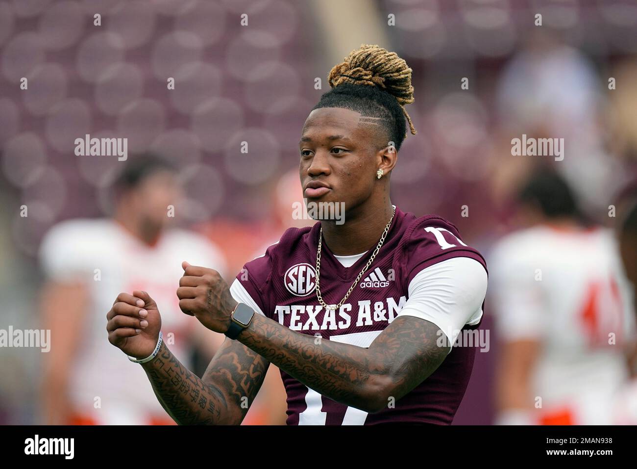 Texas A&M defensive back Jaylon Jones (17) watches warm ups before an ...
