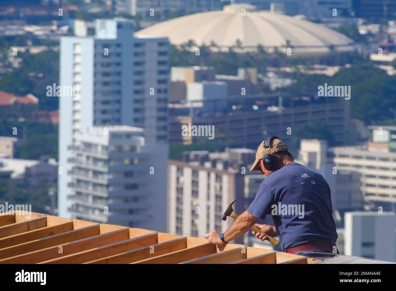 January 19, 2023, Honolulu, Hawaii, USA: A carpenter installs ridge ...