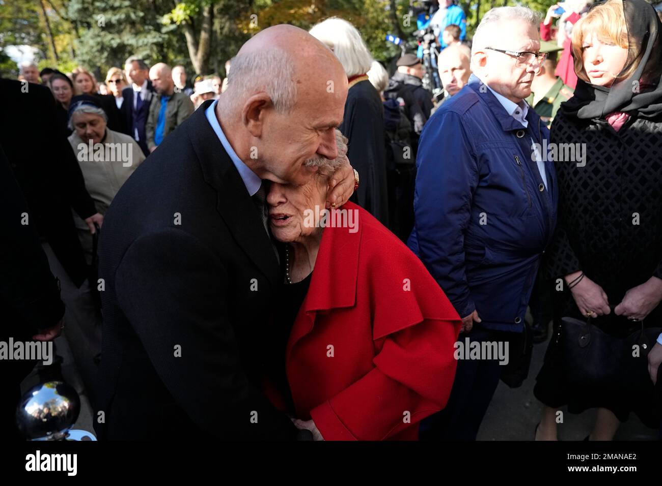 People react, during former Soviet President Mikhail Gorbachev's funeral at Novodevichy Cemetery ...