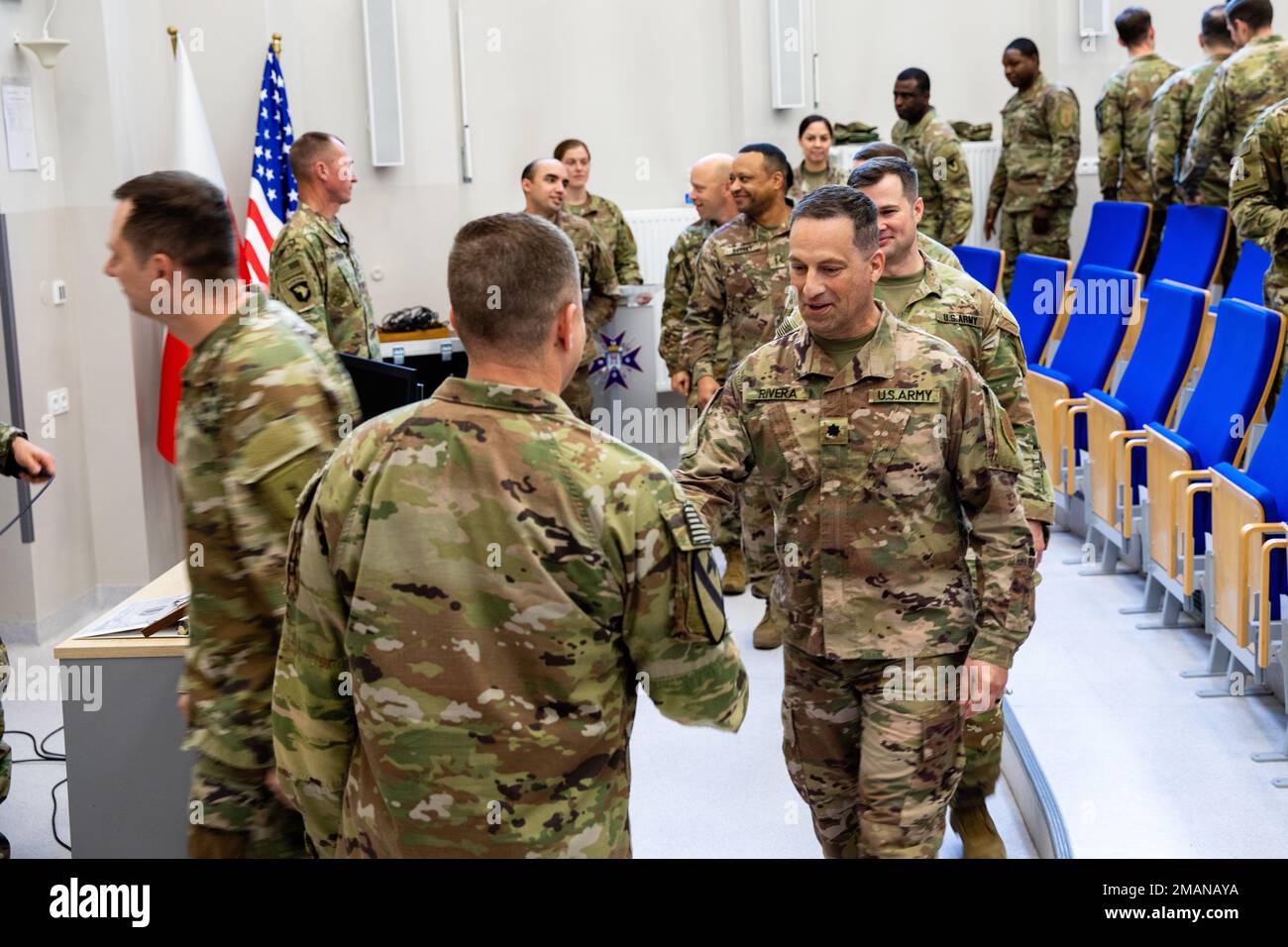 U.S. Soldiers congratulate newly promoted U.S. Army Brig. Gen. Geoffrey ...