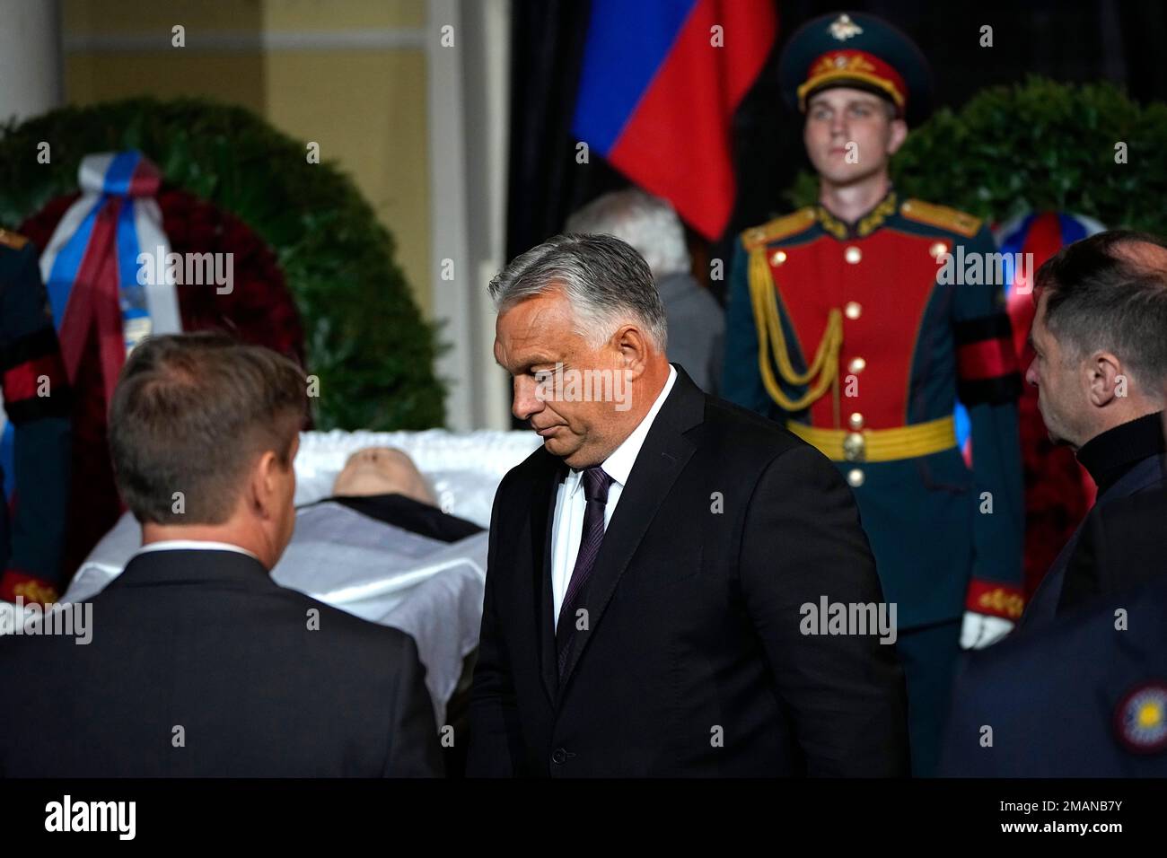 Hungary's Prime Minister Viktor Orban walks next to the coffin of ...