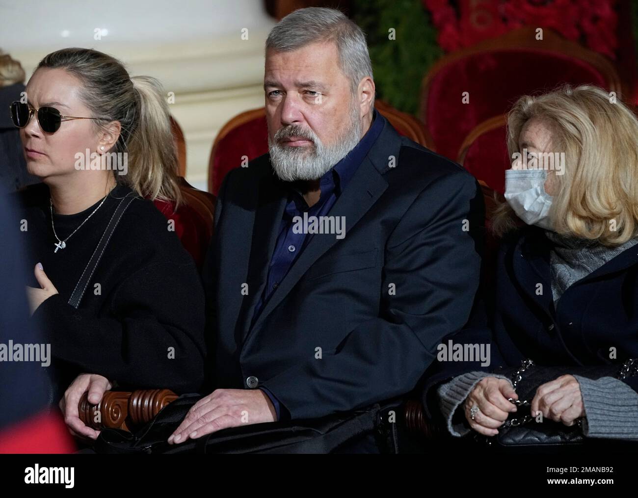 Nobel Peace Prize winner Dmitry Muratov, centre, editor-in-chief of the influential Russian ...