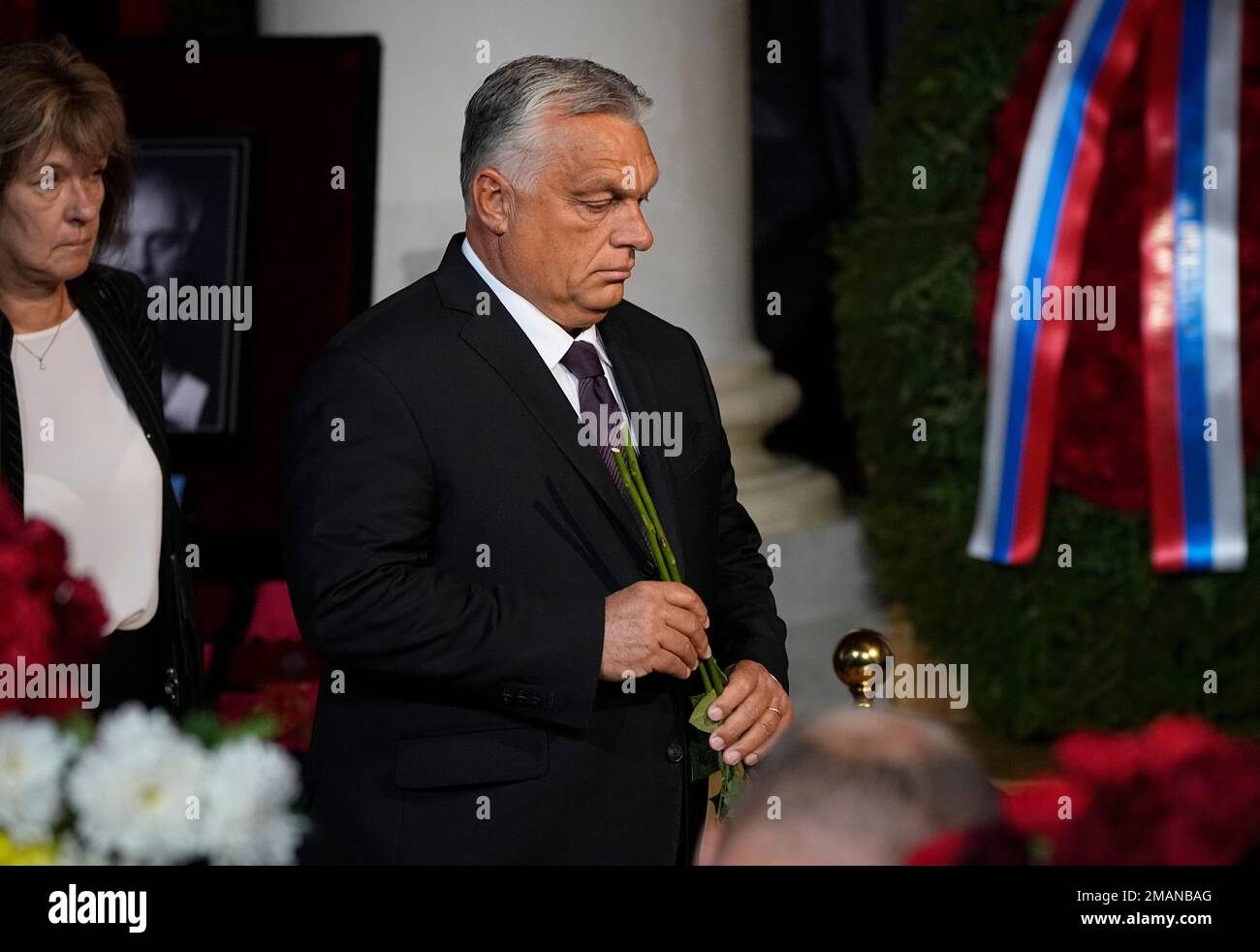 Hungary's Prime Minister Viktor Orban walks to the coffin of former ...