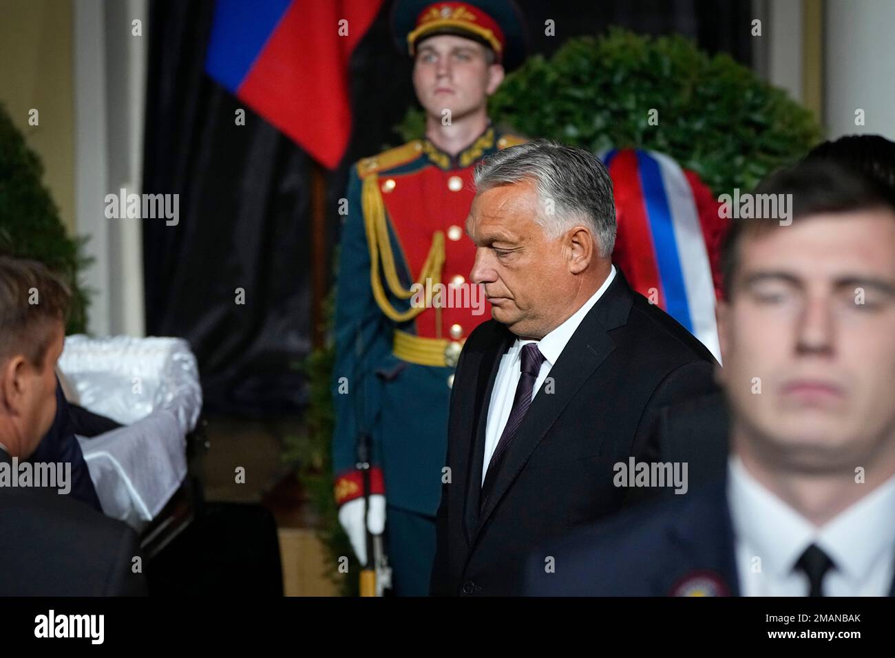 Hungary's Prime Minister Viktor Orban walks next to the coffin of ...