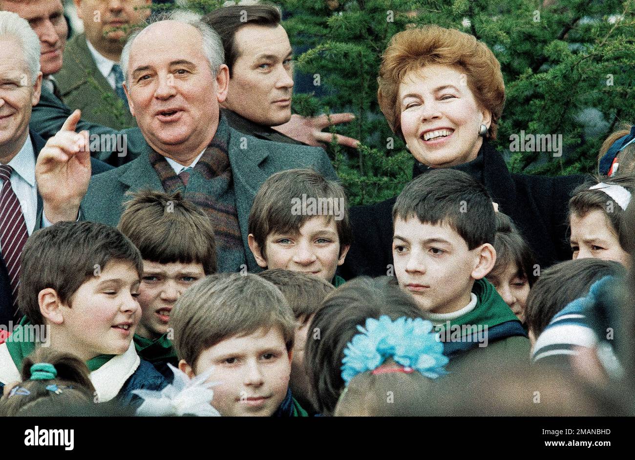 FILE - Soviet leader Mikhail Gorbachev with his wife Raisa pose with a ...