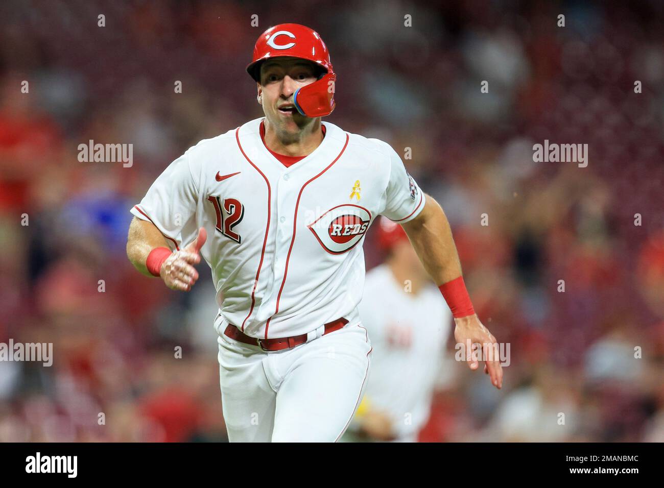 Cincinnati Reds' Spencer Steer runs from third base during a baseball ...