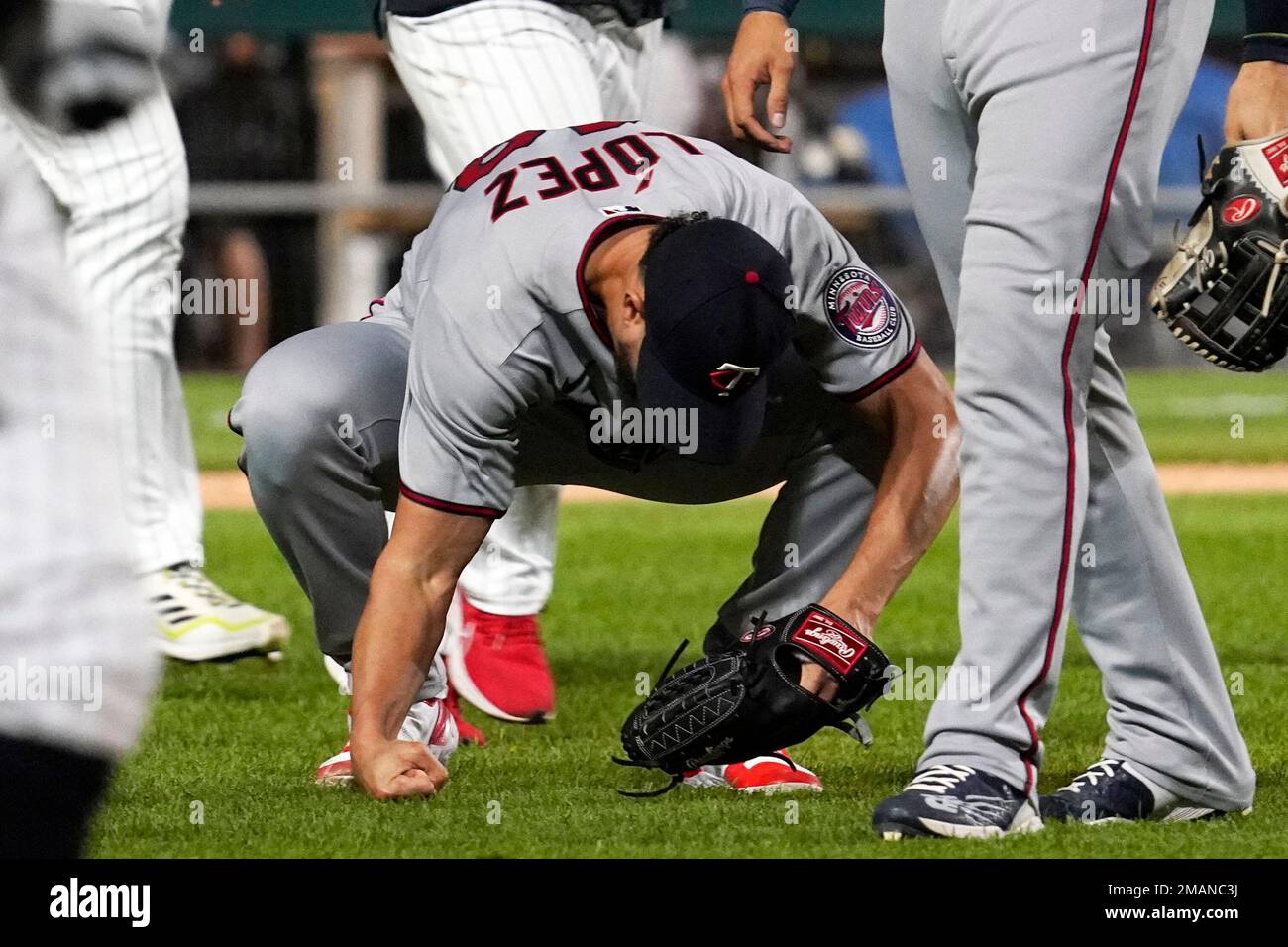 Minnesota Twins relief pitcher Jorge Lopez reacts after the team's 4-3 ...