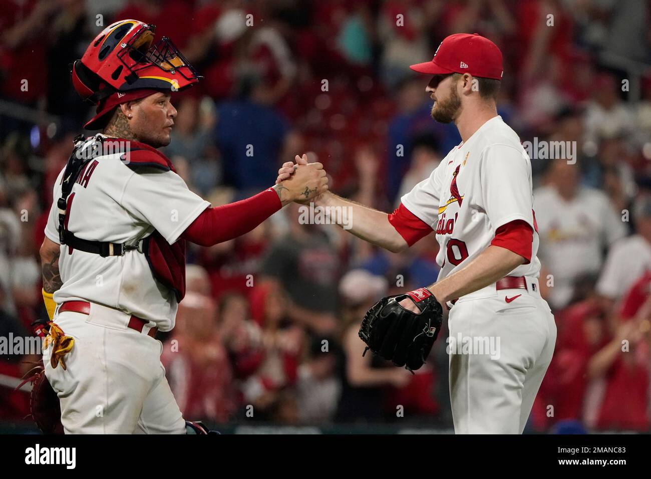 St. Louis Cardinals catcher Yadier Molina and relief pitcher Chris ...
