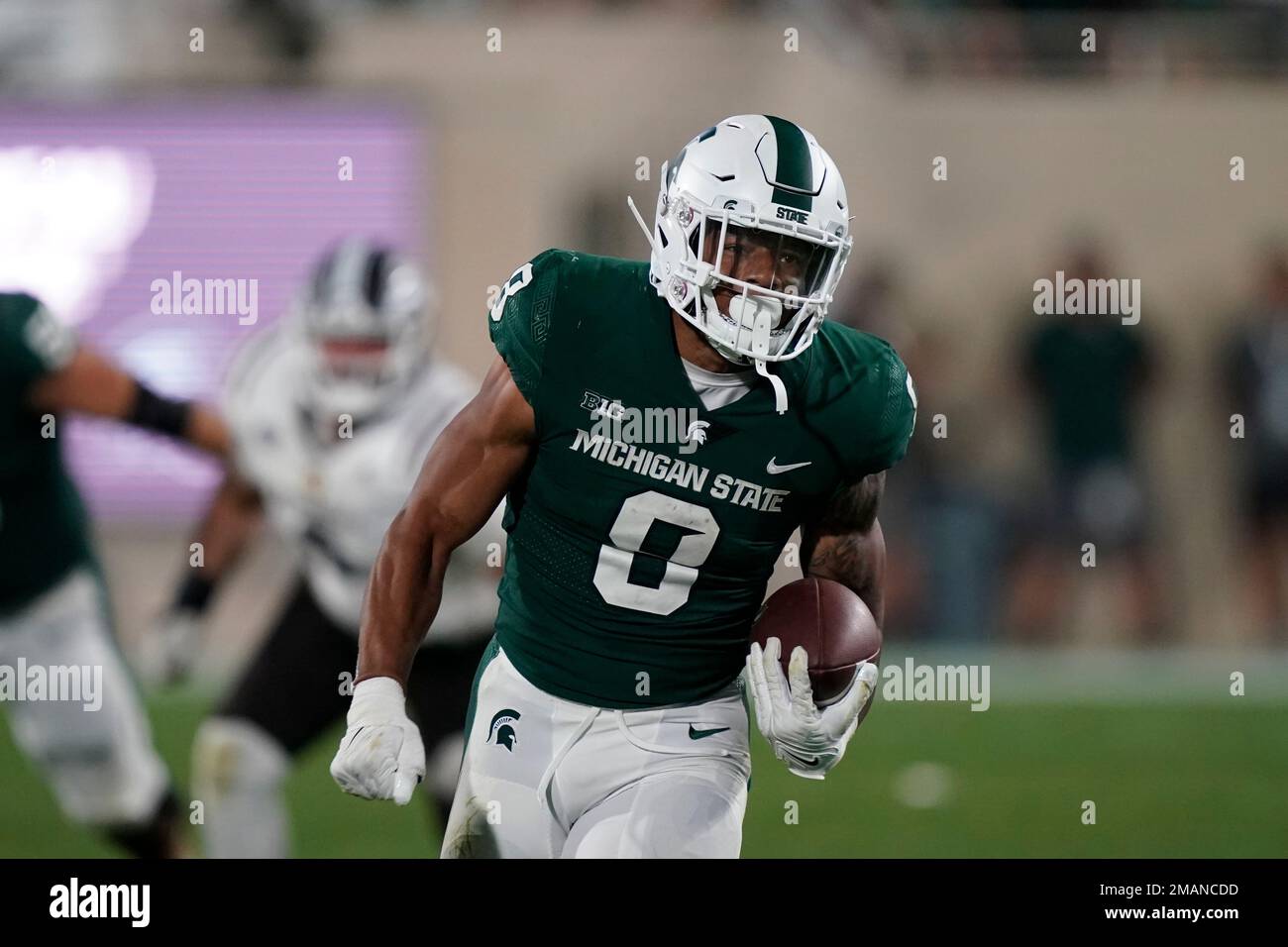 Michigan State running back Jalen Berger rushes during the second half ...
