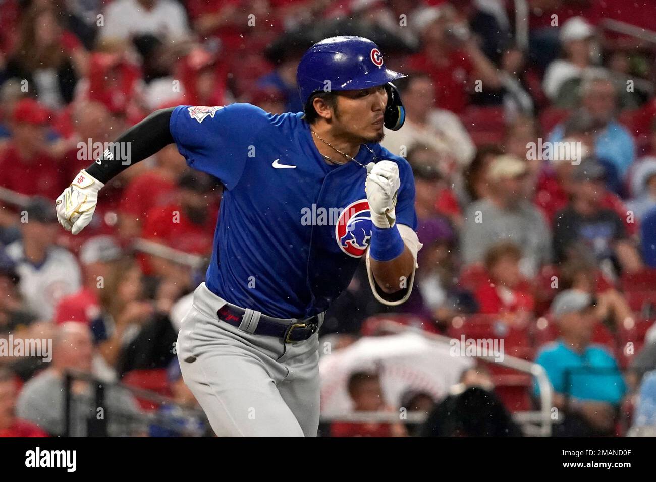 Chicago Cubs' Seiya Suzuki singles during the first inning of a ...