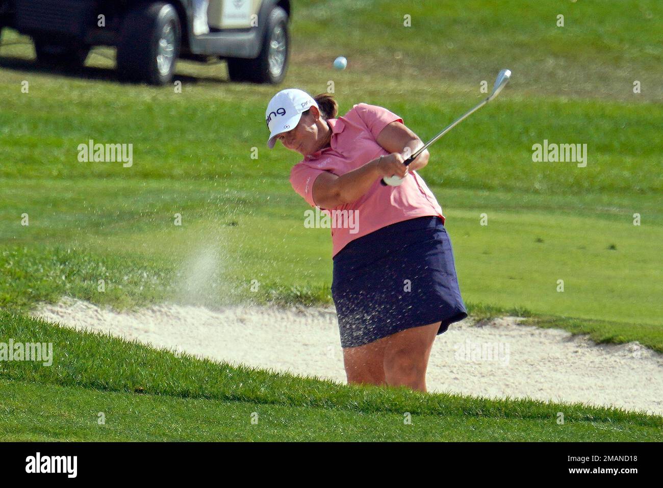 Angela Stanford hits out of a fairway bunker on the ninth hole during ...