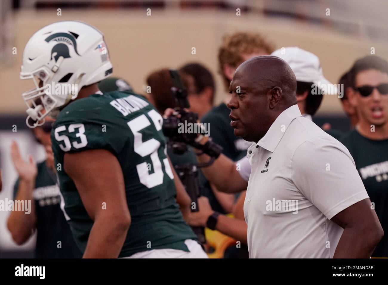 Michigan State head coach Mel Tucker runs onto the field before the ...