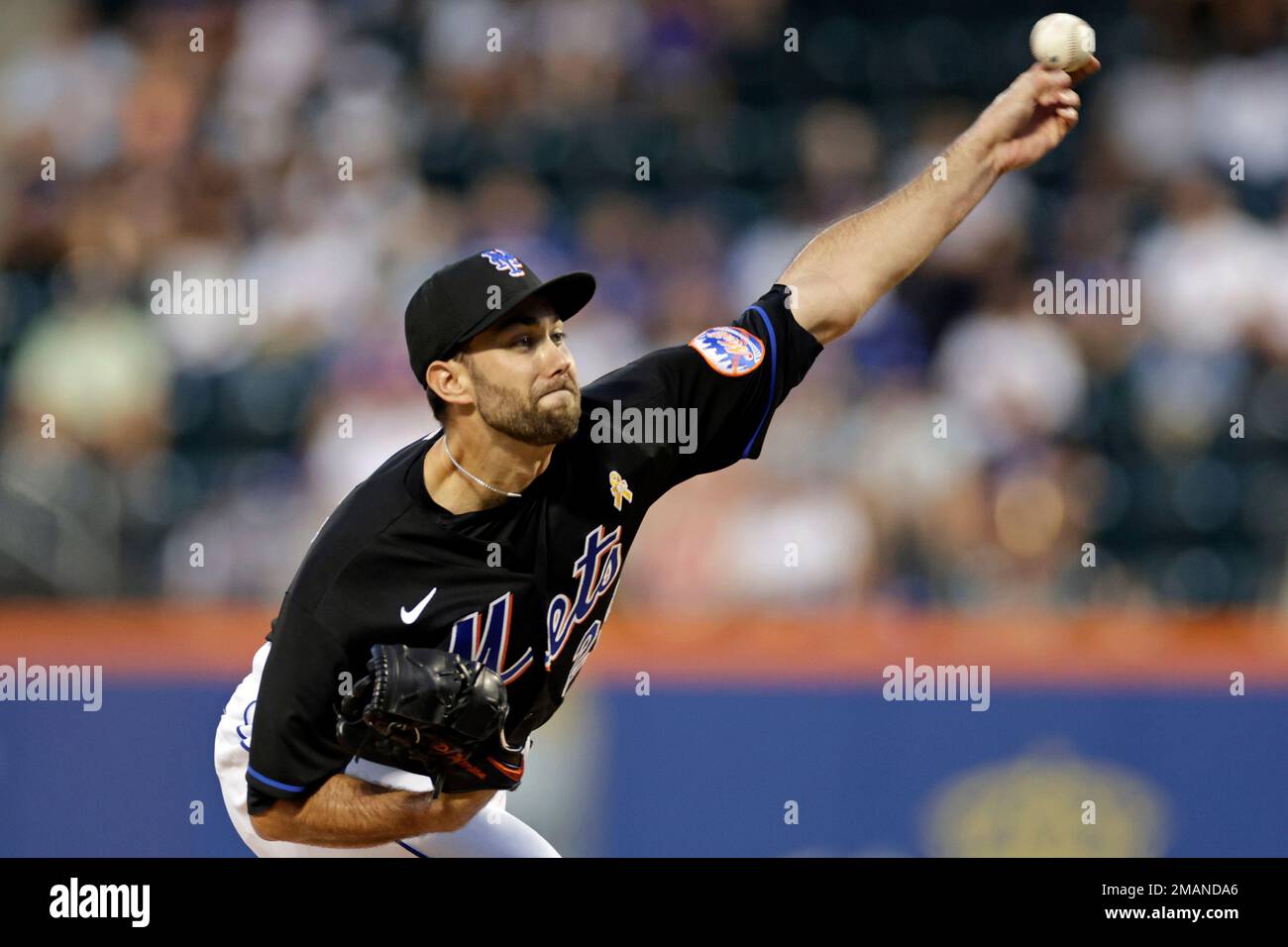 New York Mets pitcher David Peterson throws during the first inning of ...